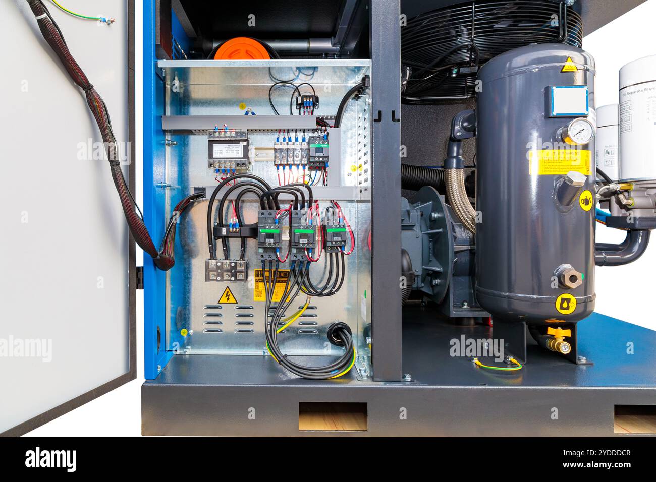 Close-up view of the complex internal wiring, pressure tank, and ...