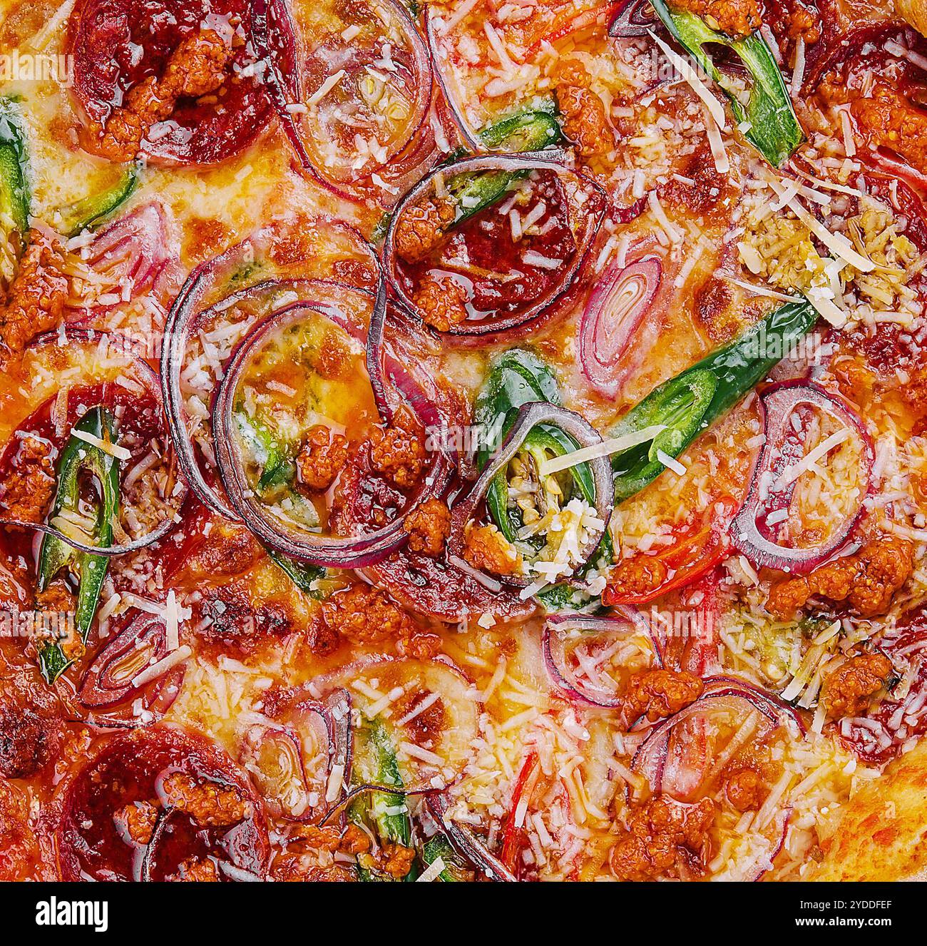 Pepperoni sausage and green pepper pizza Stock Photo - Alamy