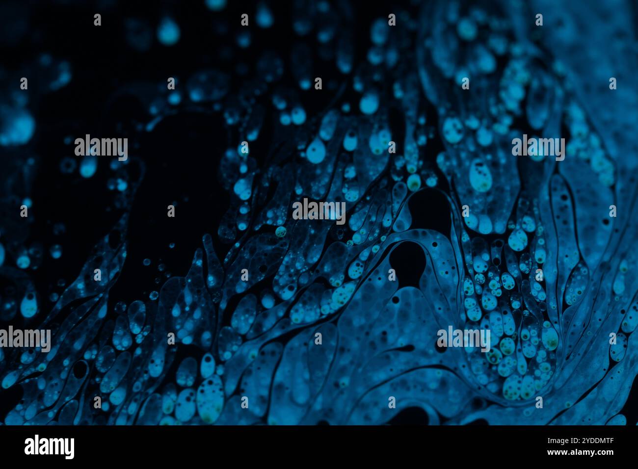 Bright blue dots on black background, oil stains movement, bright ...