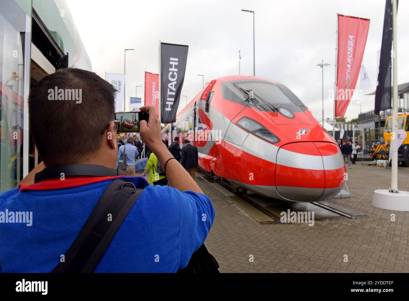 People viewing a new Hitachi Frecciarossa 1000 high speed train for Trenitalia at world public ...