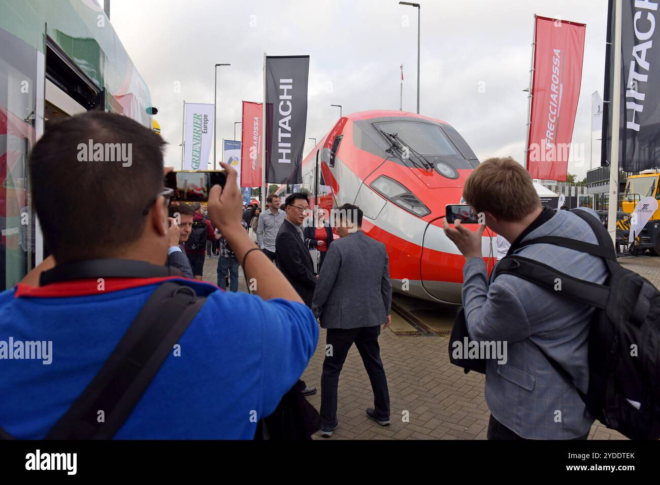 People viewing a new Hitachi Frecciarossa 1000 high speed train for Trenitalia at world public ...