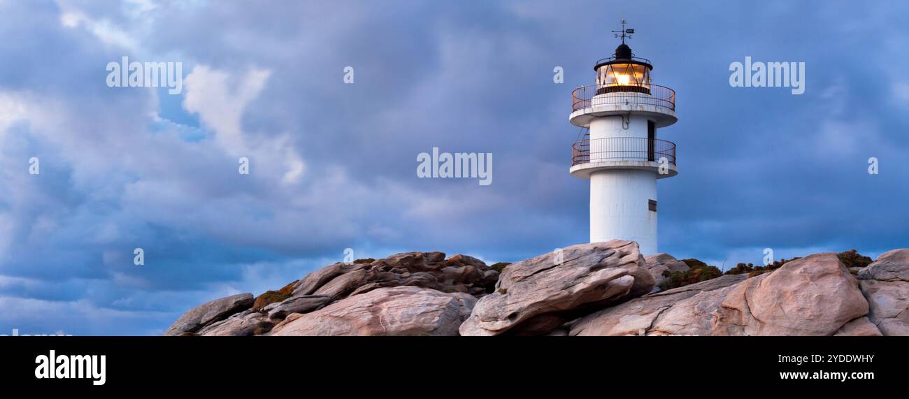 Working Lighthouse at Bad Weather Stock Photo - Alamy