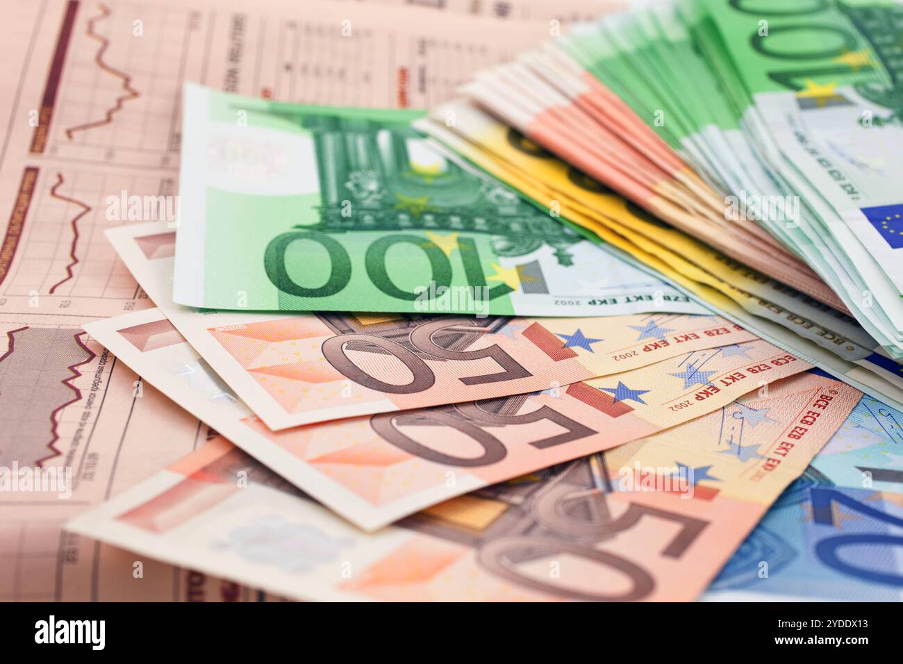 Euro notes on a financial newspaper Stock Photo - Alamy