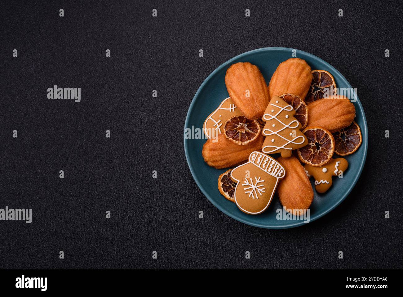 French classic madeleine sponge cake with elements of Christmas motifs ...