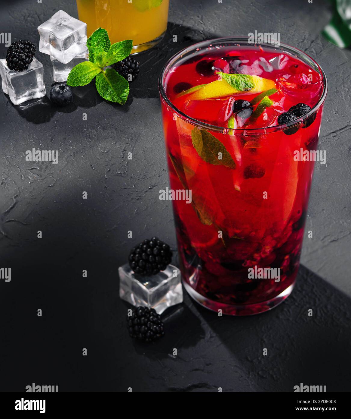 Red cocktail ice orange straw hi-res stock photography and images - Alamy