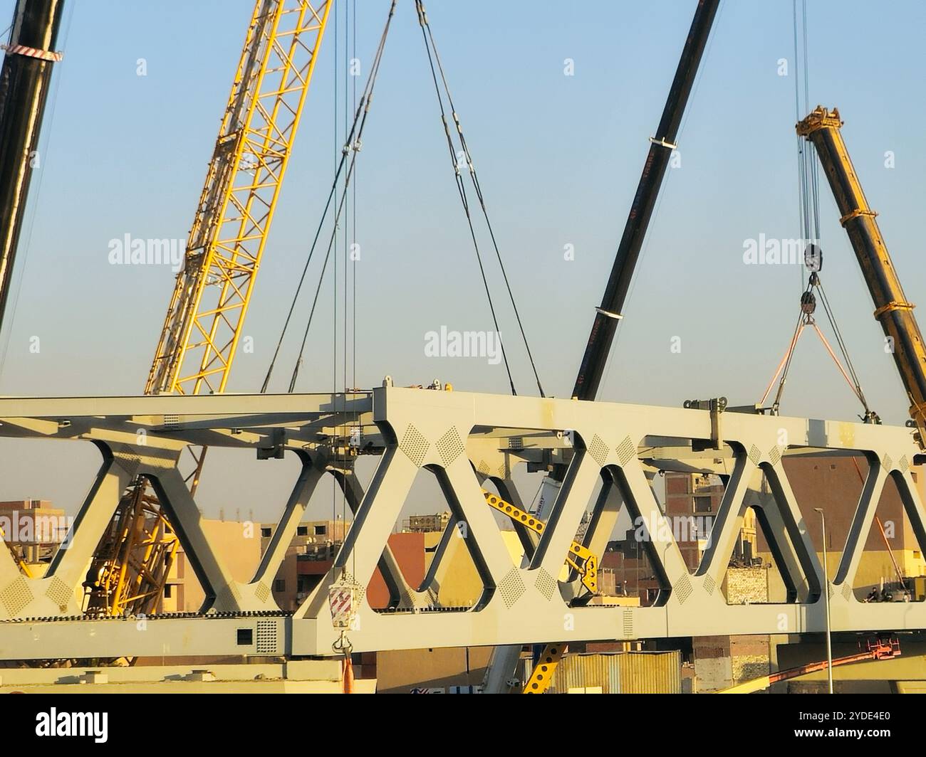 Giza, Egypt, October 11 2024: Cranes and steel metal frame at a ...