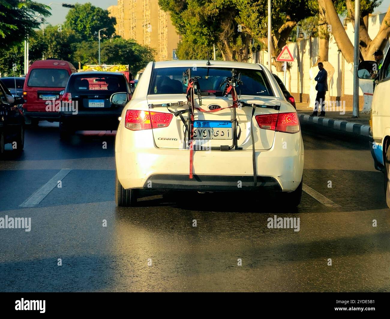 Cairo, Egypt, October 12 2024: A KIA Cerato car with a bicycle holder bike rack on its back, KIA ...