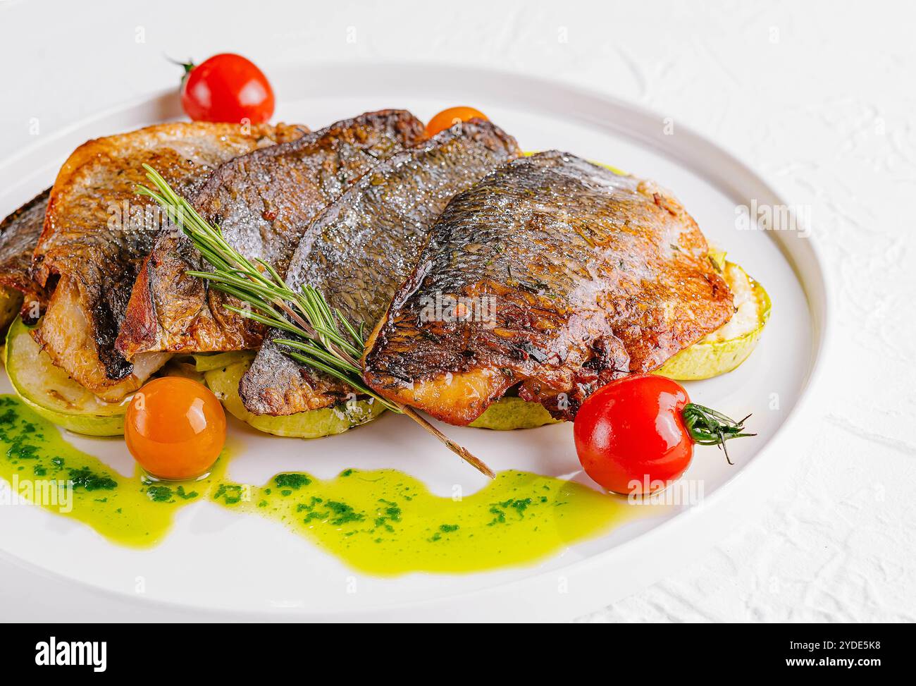 Baked trout fish vegetables hi-res stock photography and images - Alamy