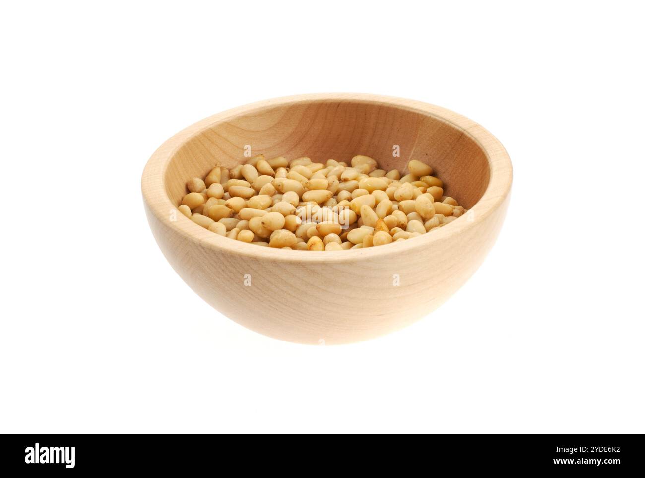 Pine nuts in bowl Cut Out Stock Images & Pictures - Alamy