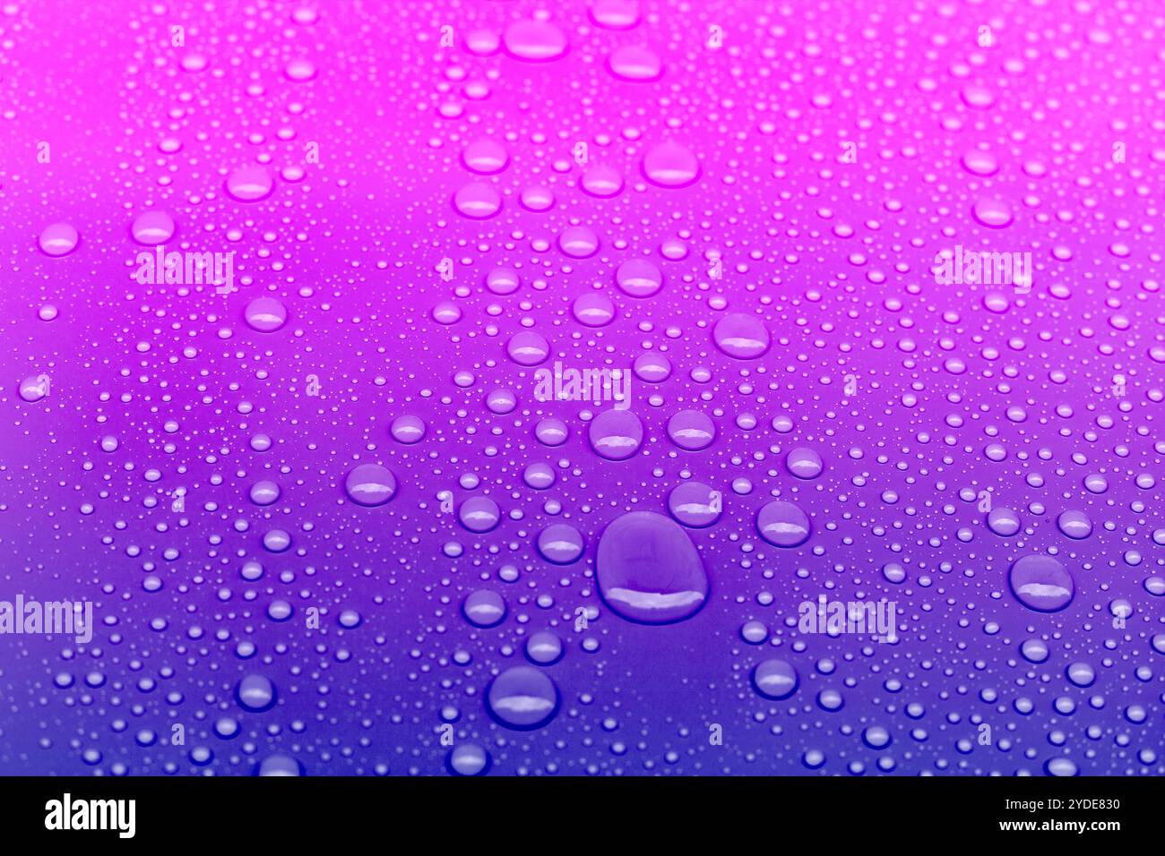 Neon colored glowing liquid drops hi-res stock photography and images ...