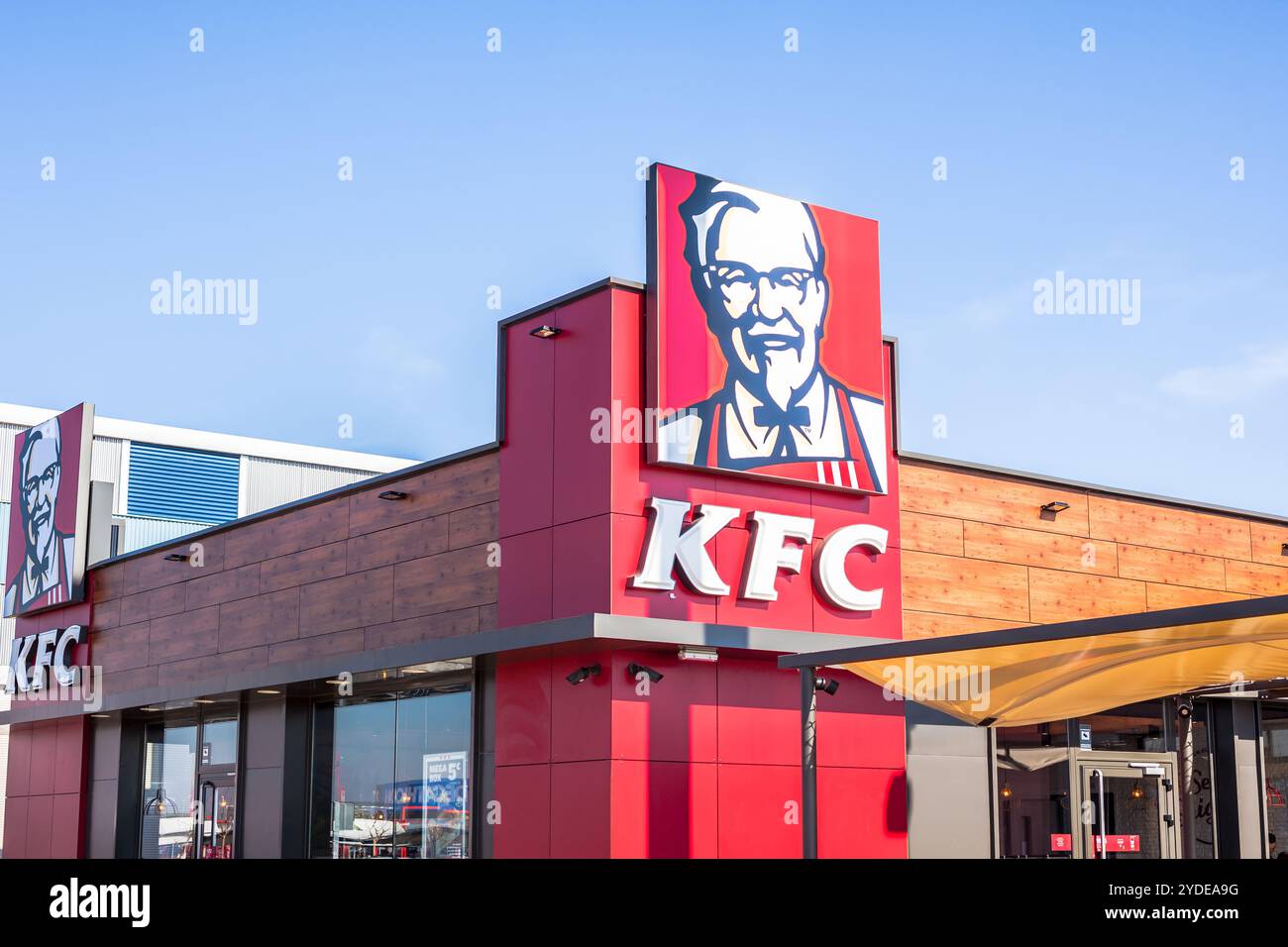 KFC fast food restaurant logo at its building Stock Photo - Alamy