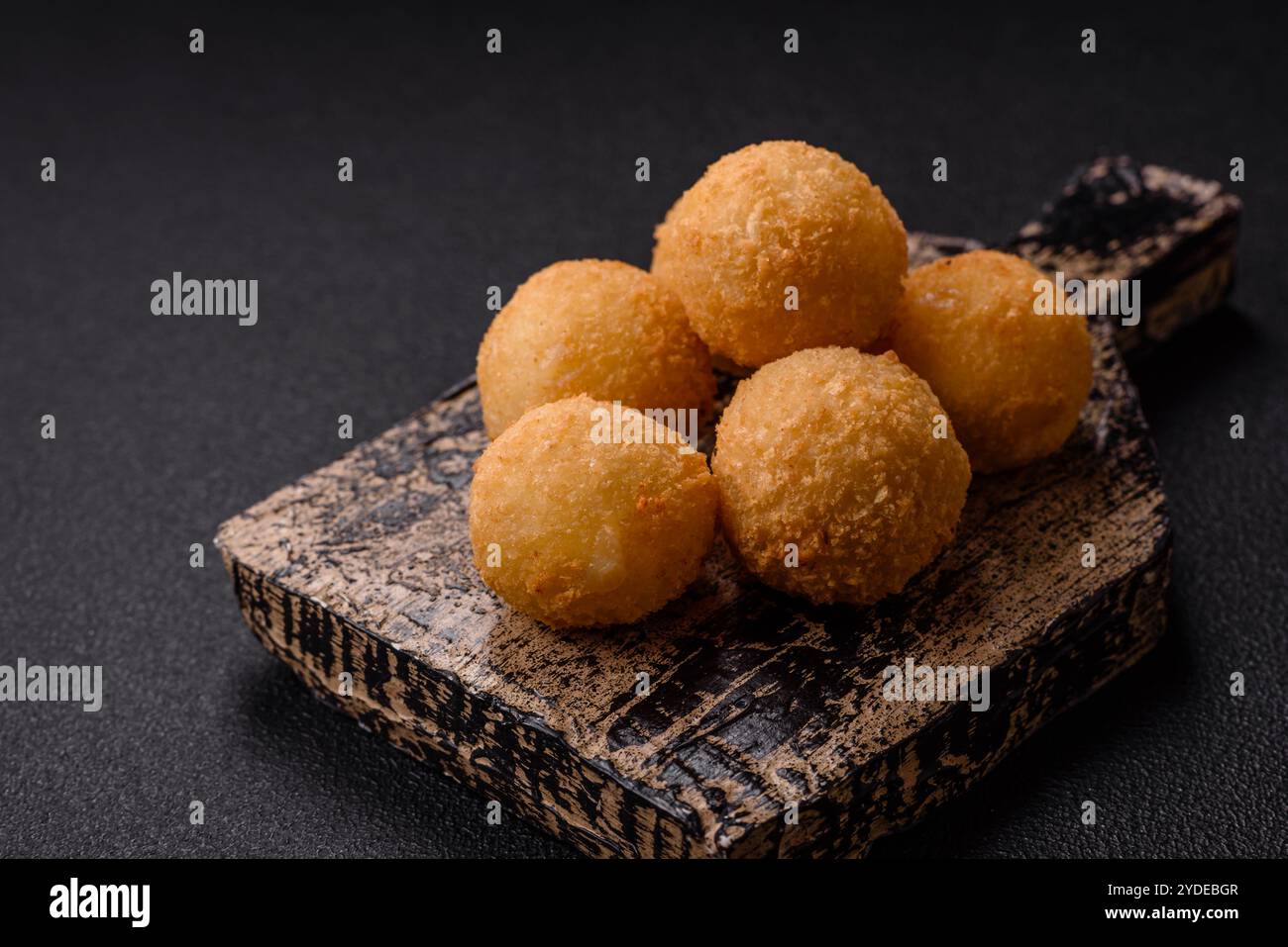 Fast food cheese balls breaded with salt and spices Stock Photo - Alamy