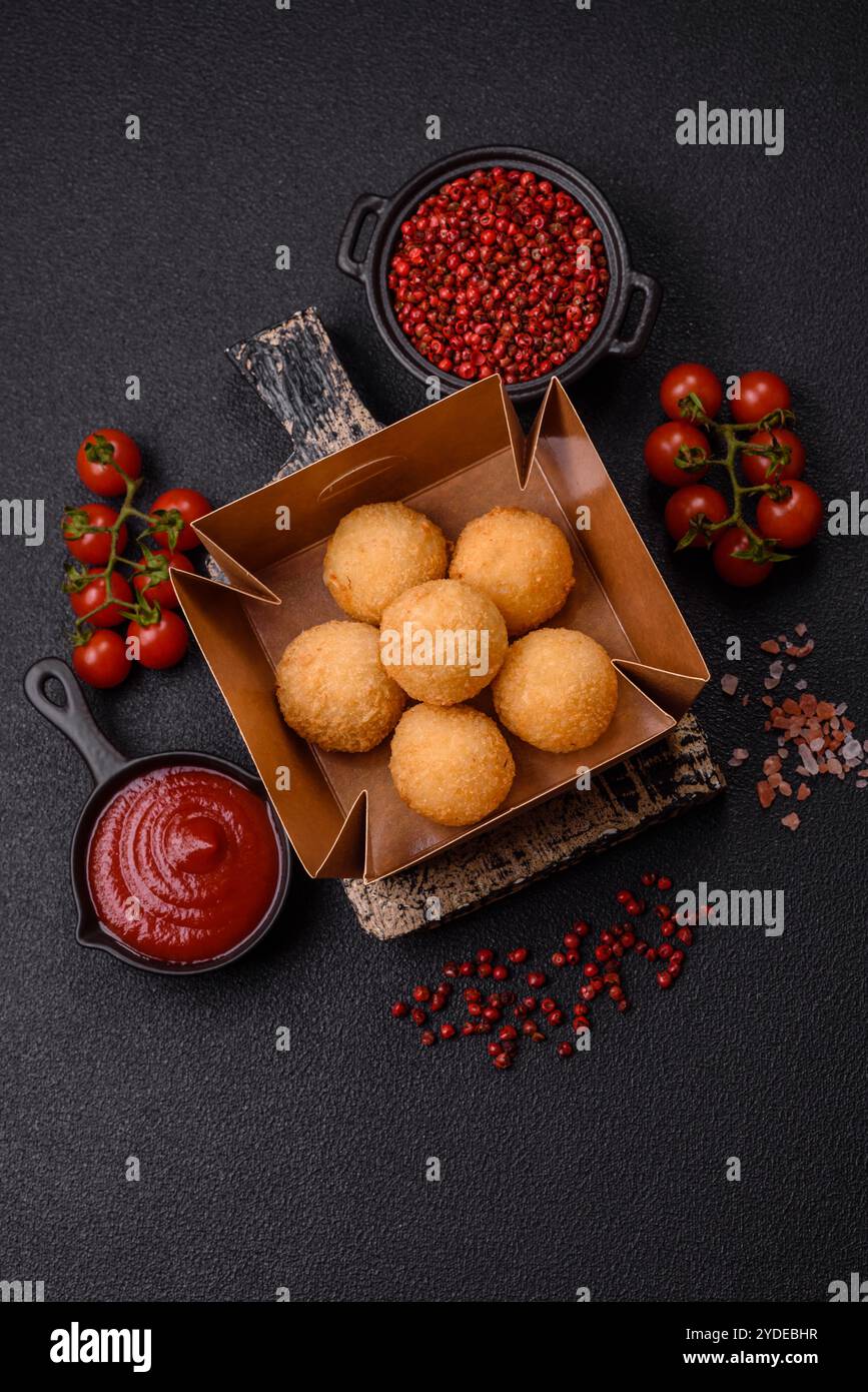 Fast food cheese balls breaded with salt and spices Stock Photo - Alamy