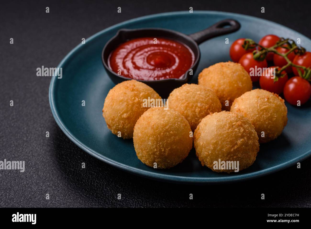 Fast food cheese balls breaded with salt and spices Stock Photo - Alamy