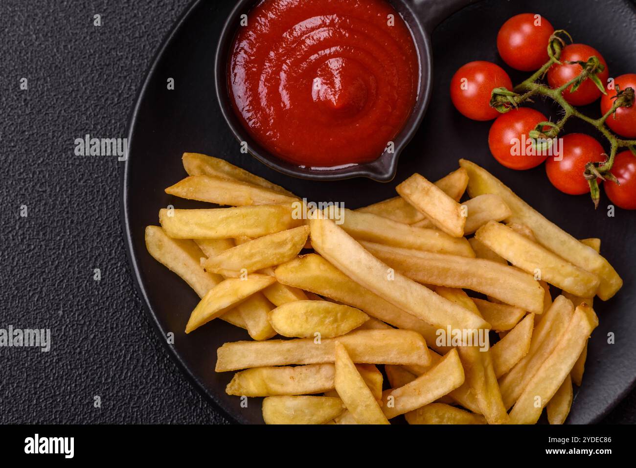 Fast food french fries with salt and spices Stock Photo - Alamy
