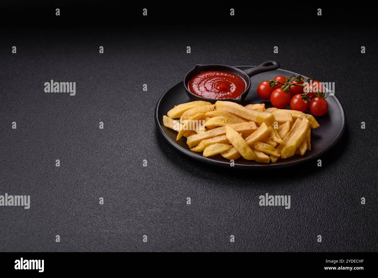 Fast food french fries with salt and spices Stock Photo - Alamy