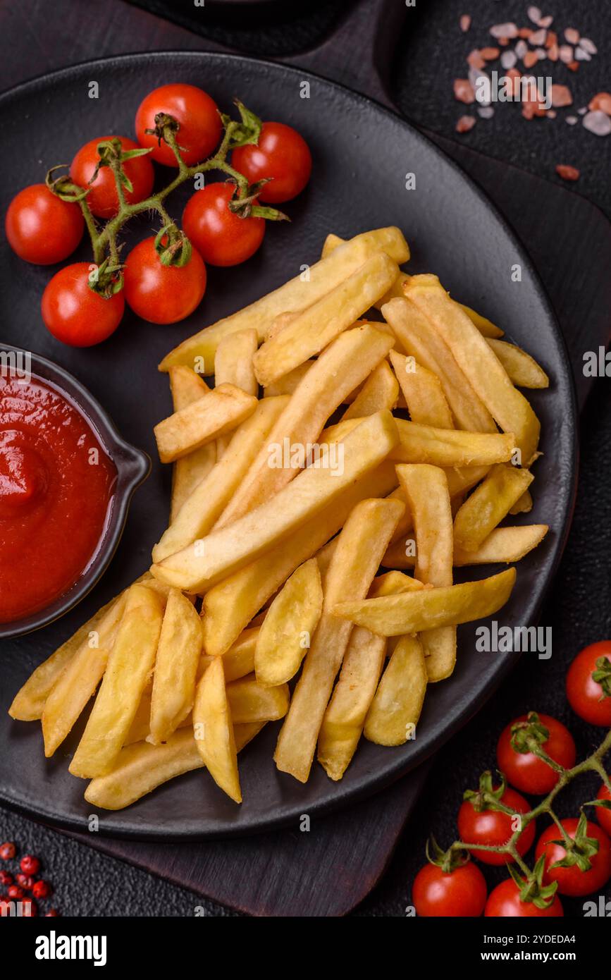 Fast food french fries with salt and spices Stock Photo - Alamy