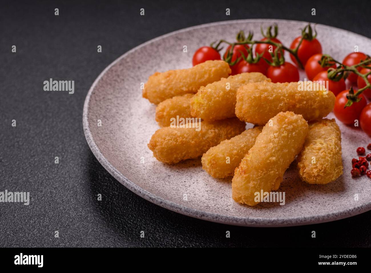 Fast food breaded cheese sticks with salt and spices Stock Photo - Alamy