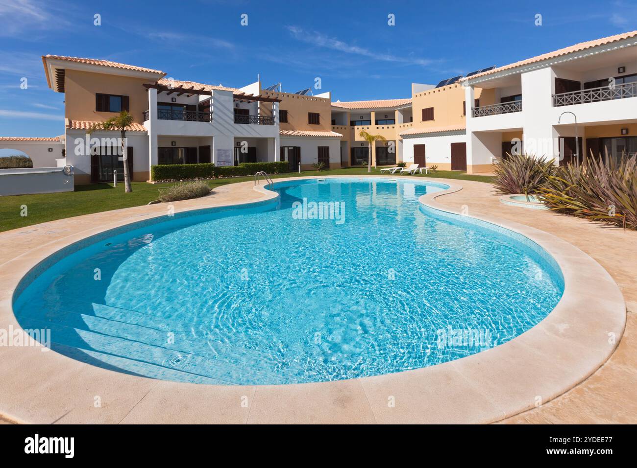 Townhouse with apartments and swimming pool Stock Photo - Alamy