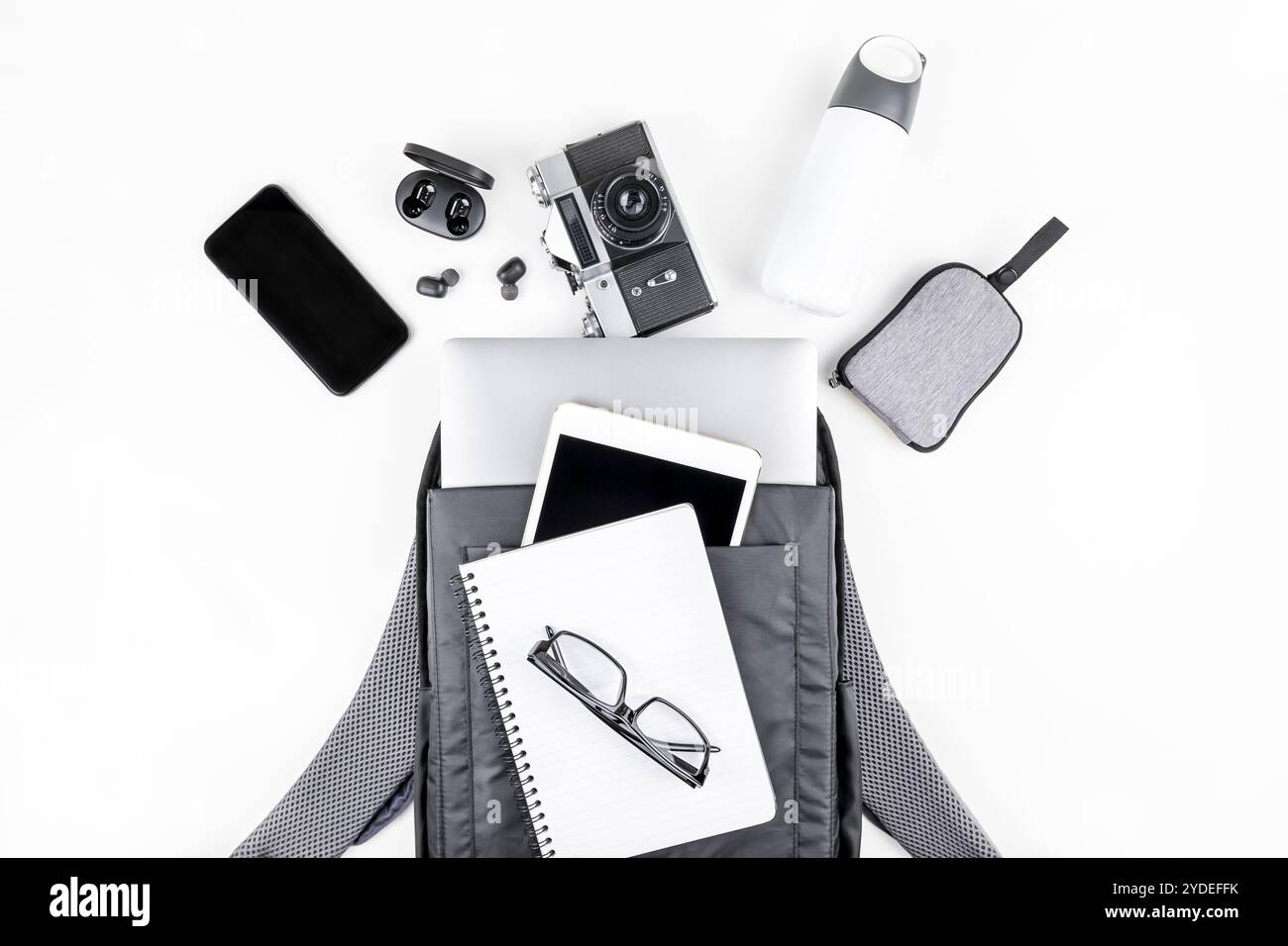 Modern backpack with laptop and tablet inside Stock Photo - Alamy