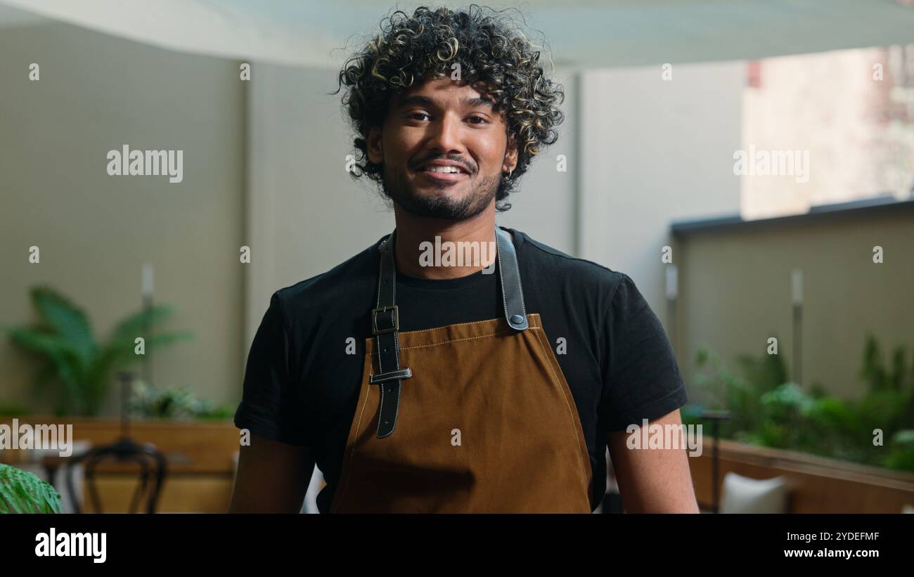 Happy cafe worker Latino American ethnic man in apron guy waiter male ...