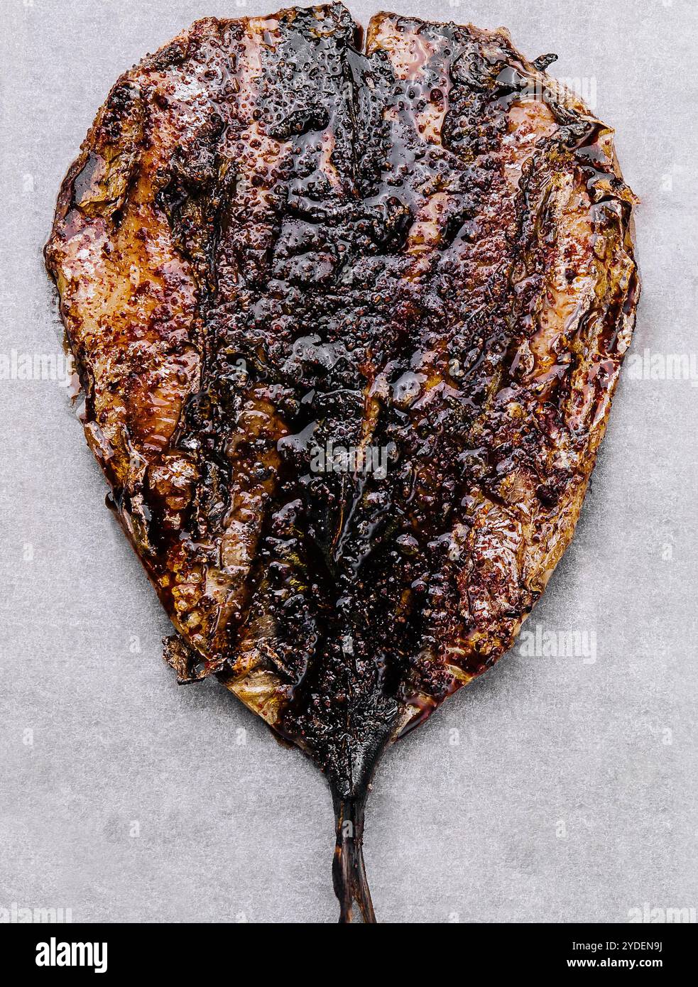 Grilled delicious fish top view Stock Photo - Alamy
