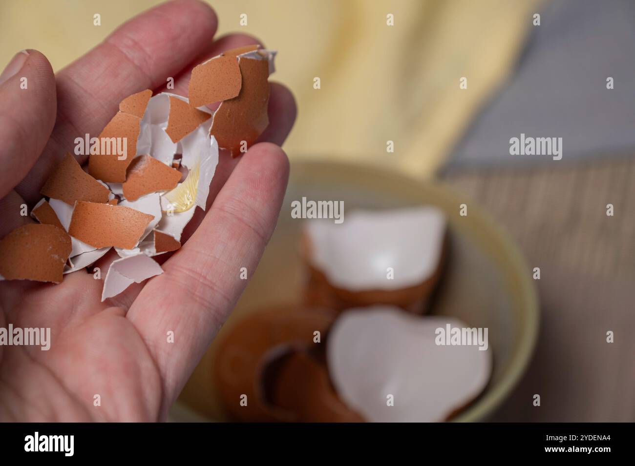 Broken egg shells in the hand ,Recycling kitchen waste, Crushed egg ...