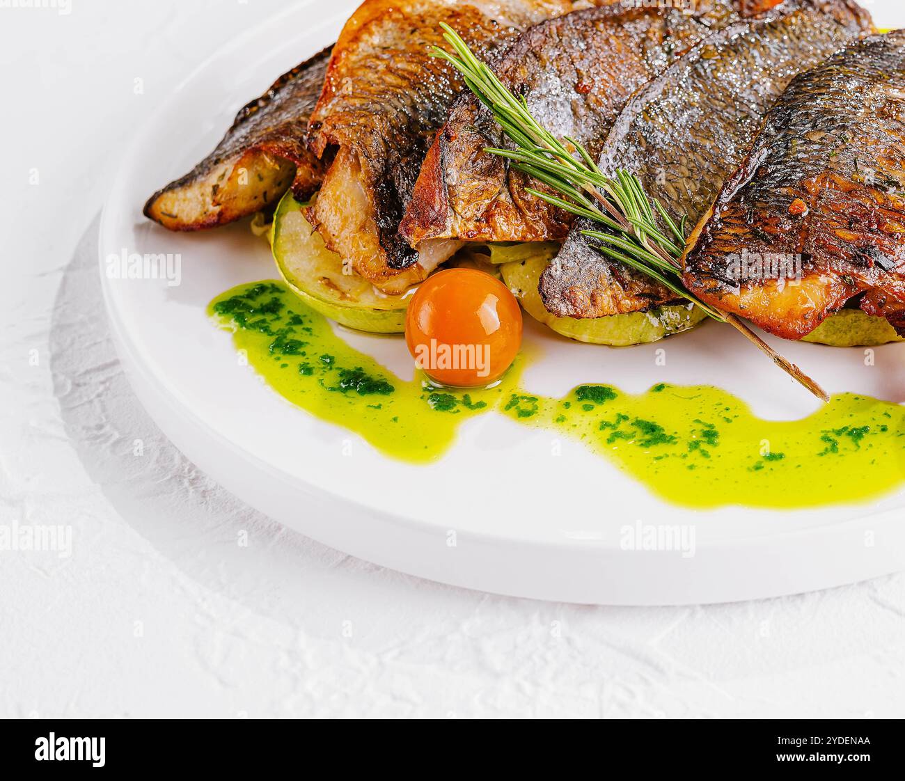 Grilled vegetables fish pesto sauce hi-res stock photography and images - Alamy