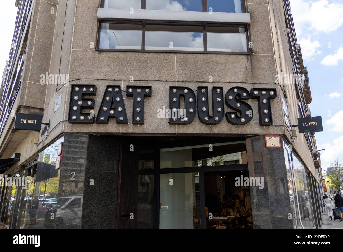 Antwerp, Belgium. 15 April 2023. Eat Dust bulb sign. black letters ...