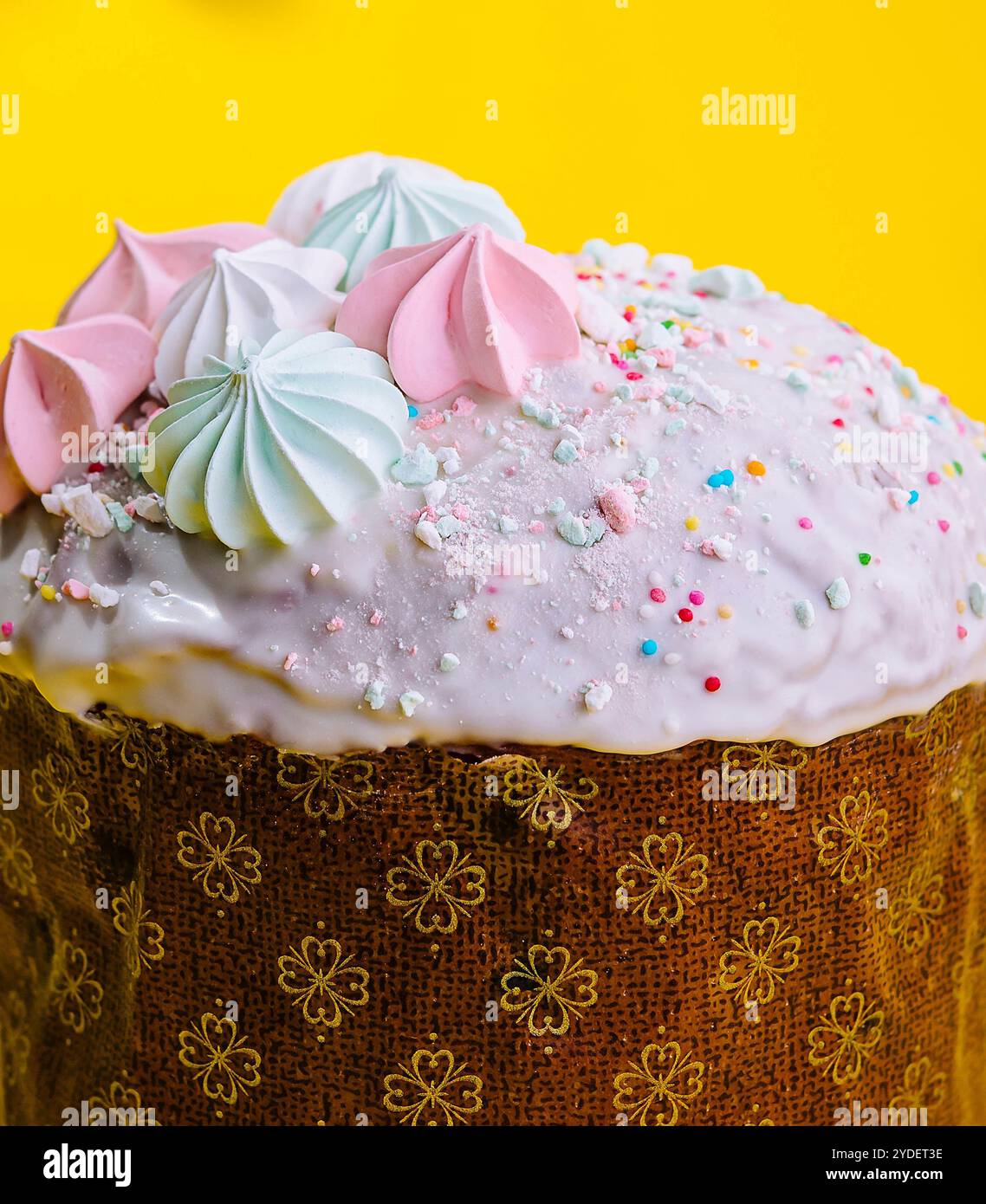 Traditional Easter cakes with meringue on yellow background Stock Photo ...