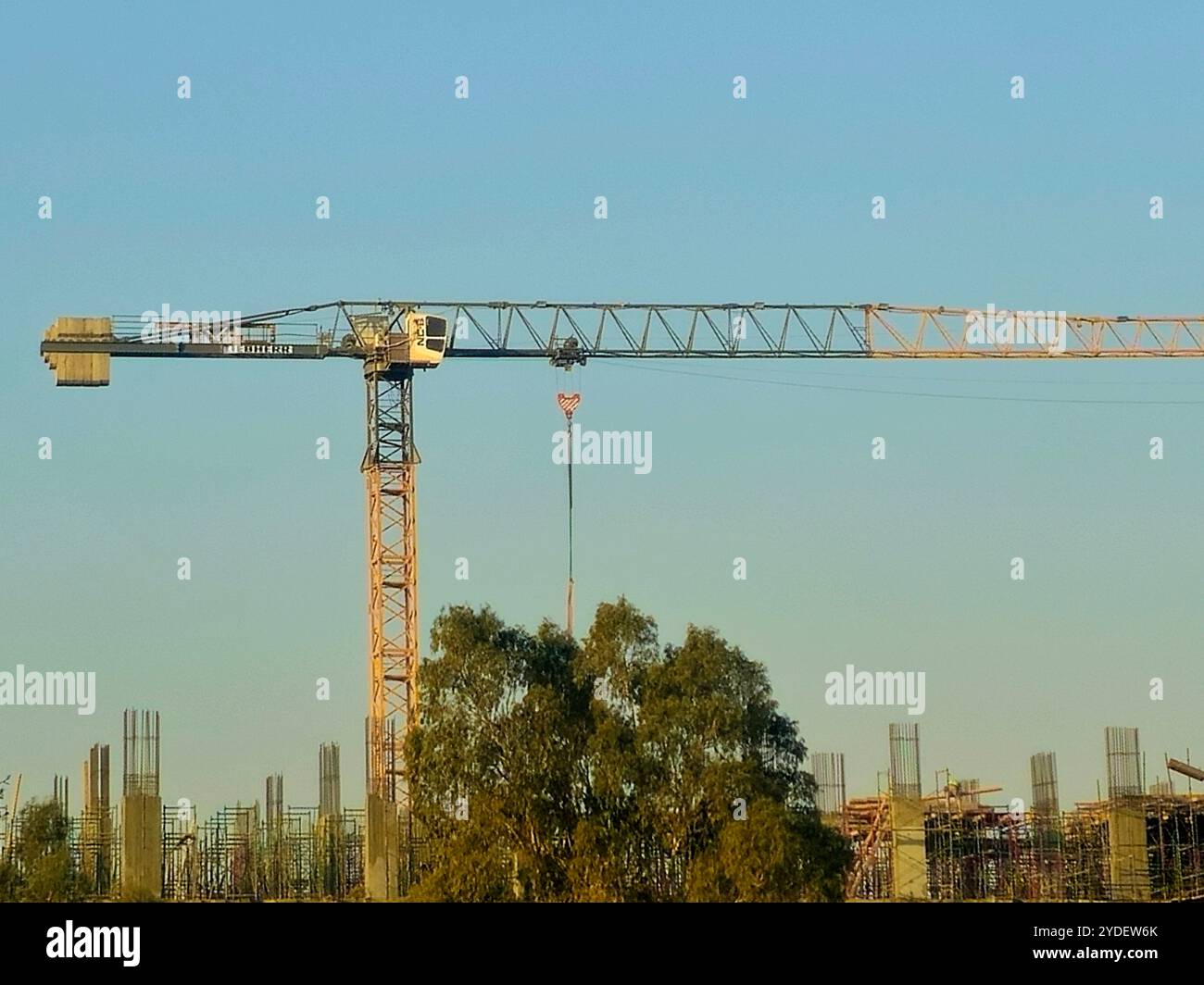Cairo, Egypt, October 16 2024: A new hospital under construction, scaffoldings, concrete and ...