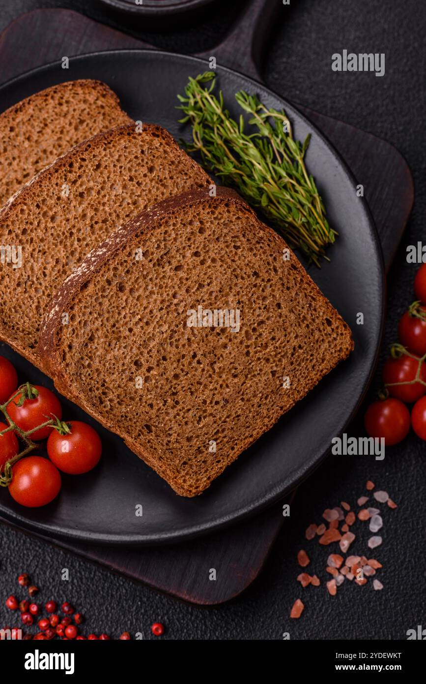 Fresh crispy brown bread sliced from whole grain flour Stock Photo - Alamy