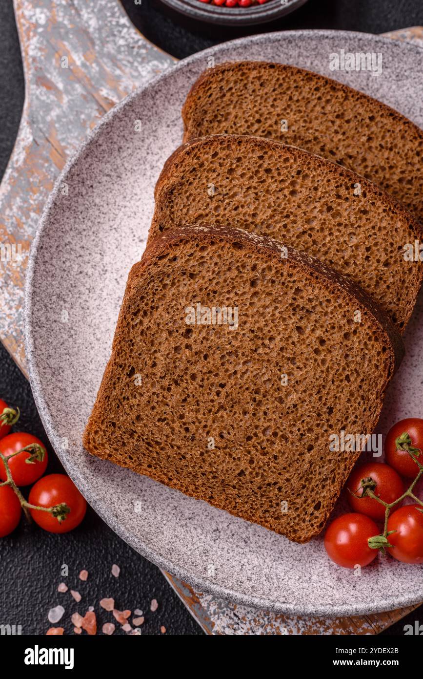 Fresh crispy brown bread sliced from whole grain flour Stock Photo - Alamy