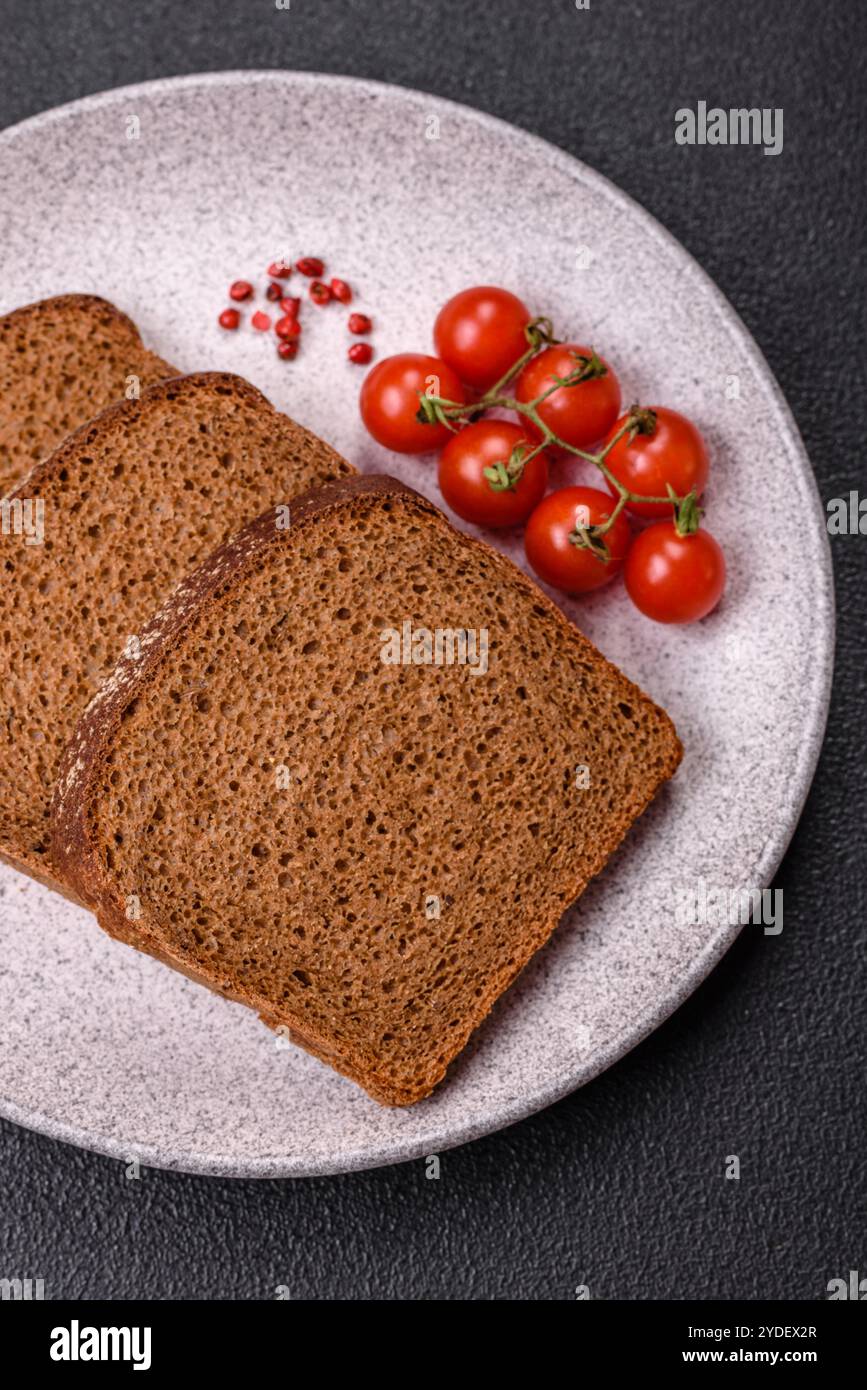 Fresh crispy brown bread sliced from whole grain flour Stock Photo - Alamy
