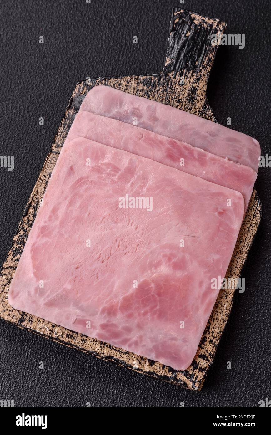 Ham cut into square slices for making delicious nutritious sandwiches ...