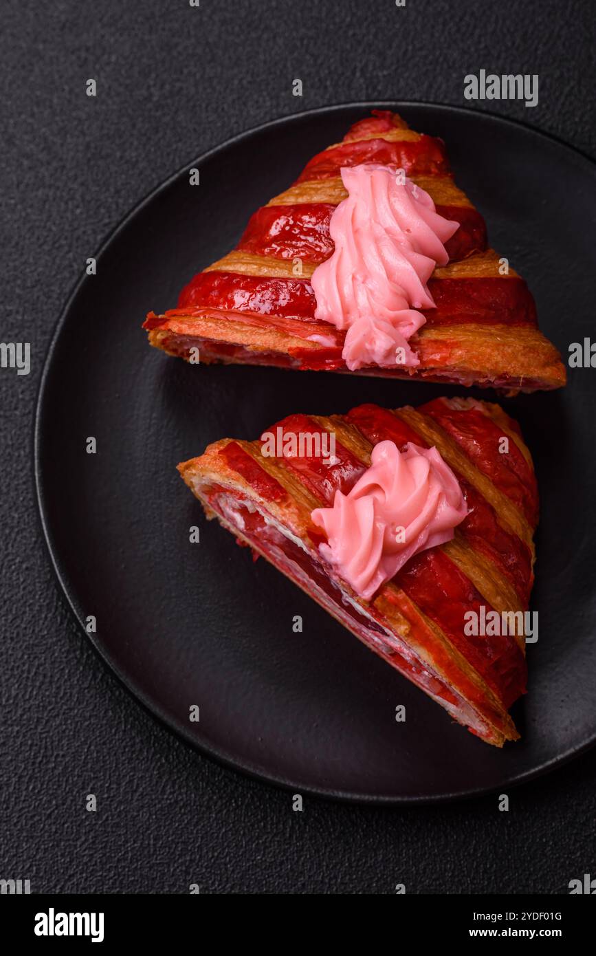 Crispy fresh red croissant with cream and strawberries Stock Photo - Alamy