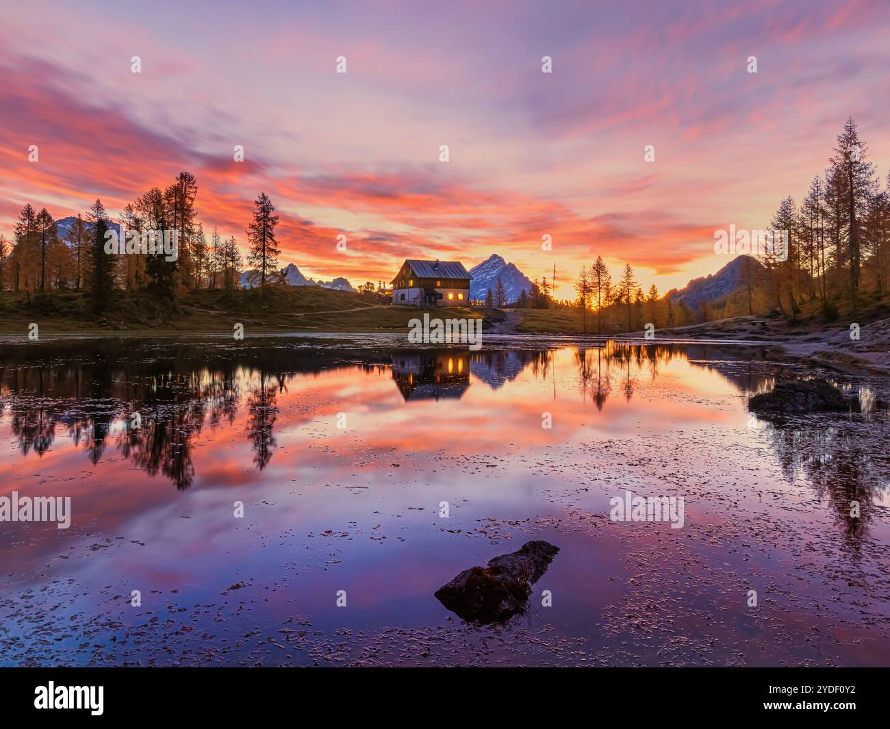 An autumn sunrise in the Dolomites at Lago Federa (Lago di Federa, Lago ...