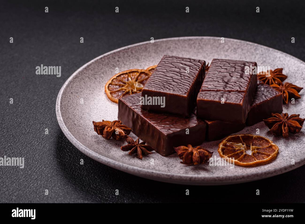 Rectangular chocolate candies with mousse and waffles Stock Photo - Alamy