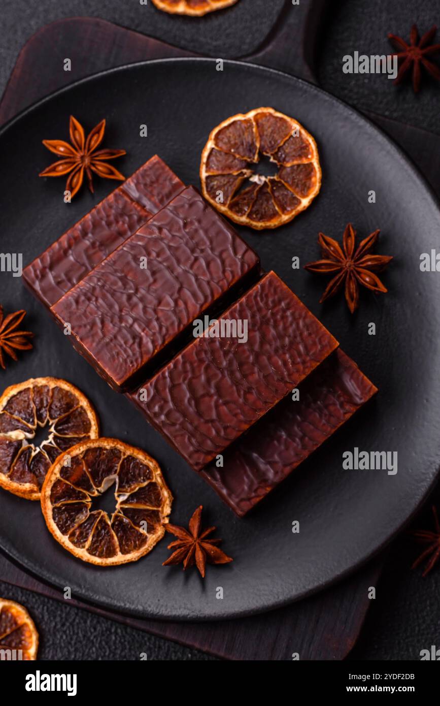 Rectangular chocolate candies with mousse and waffles Stock Photo - Alamy