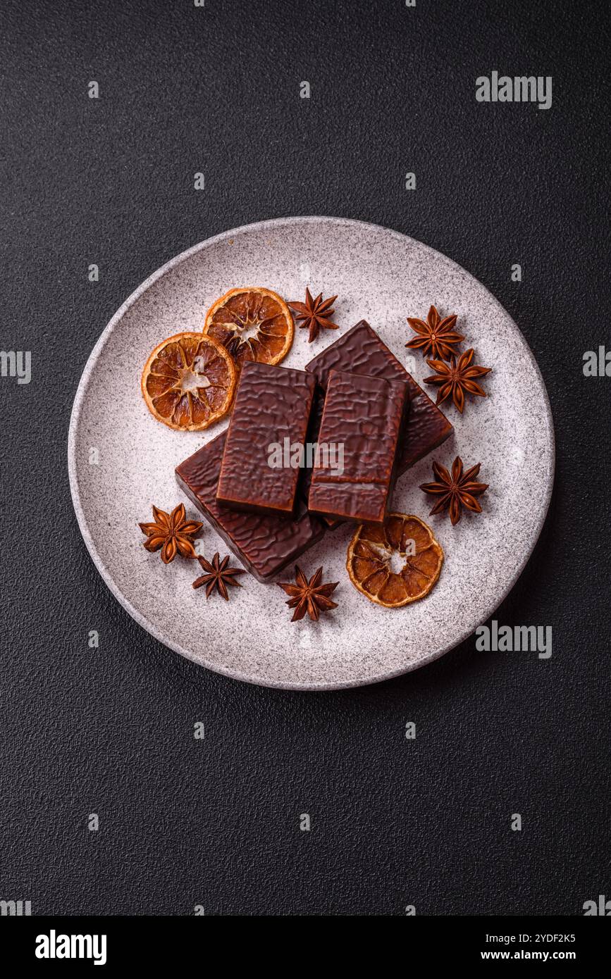 Rectangular chocolate candies with mousse and waffles Stock Photo - Alamy