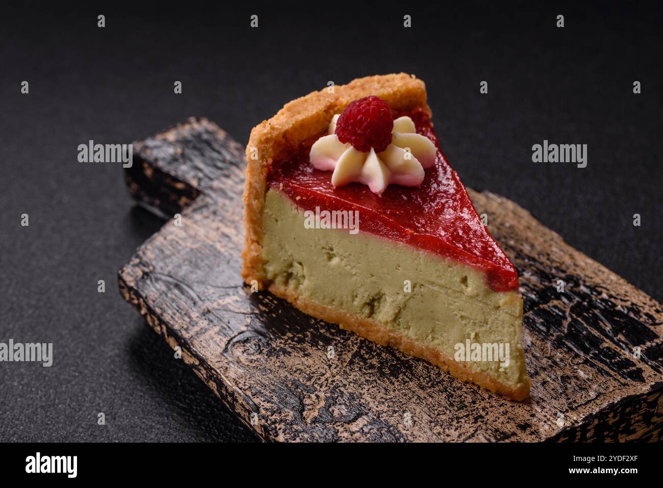 Delicious sweet dessert cheesecake with raspberry and pistachio flavor ...