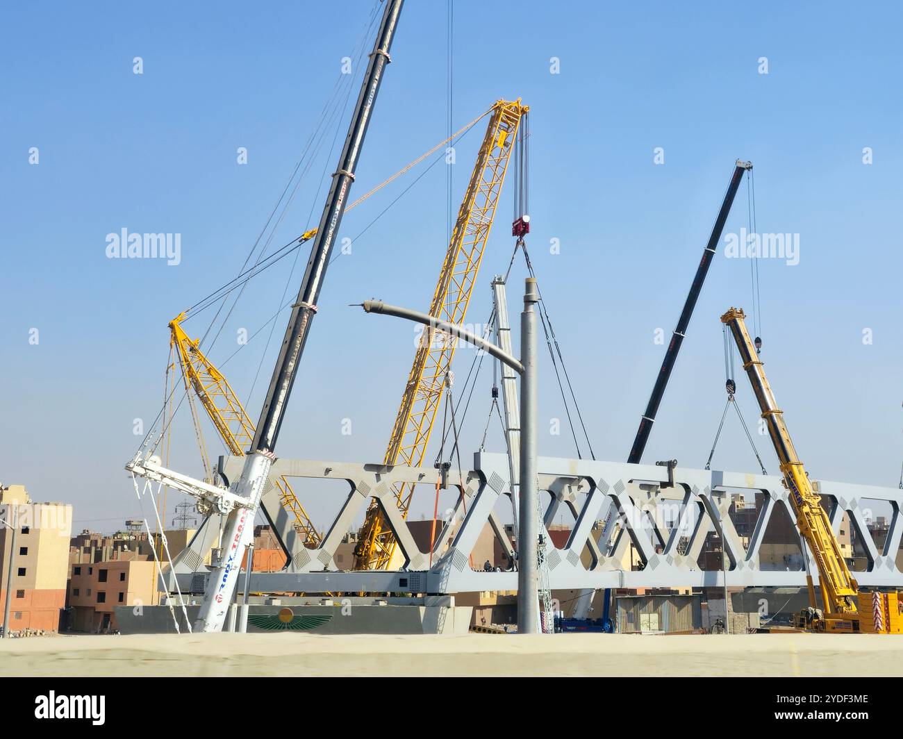 Giza, Egypt, October 6 2024: Cranes and steel metal frame at a ...