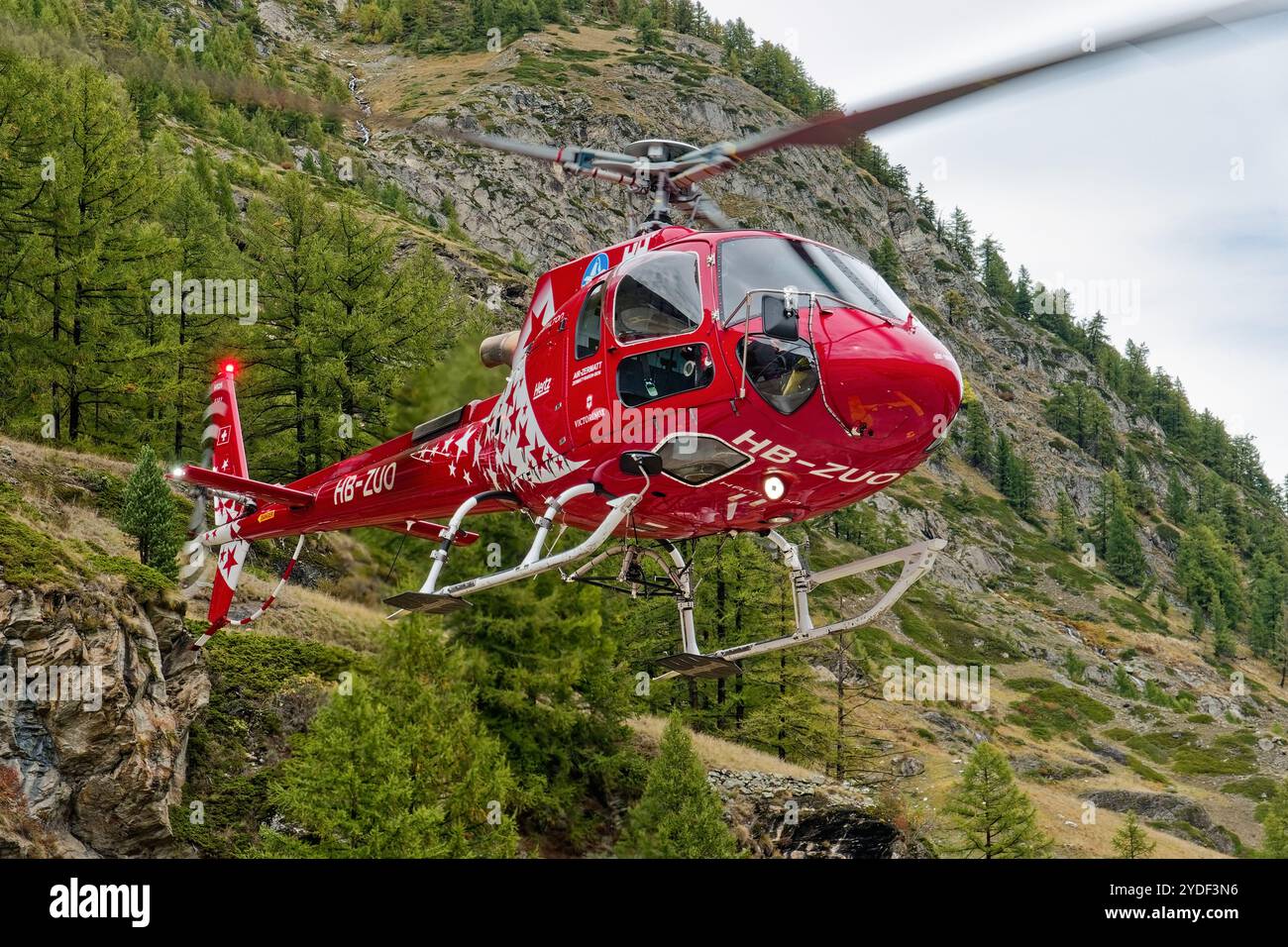Air Zermatt in Zermatt, Wallis, Switzerland. Helicopter Ecureuil H125 ...