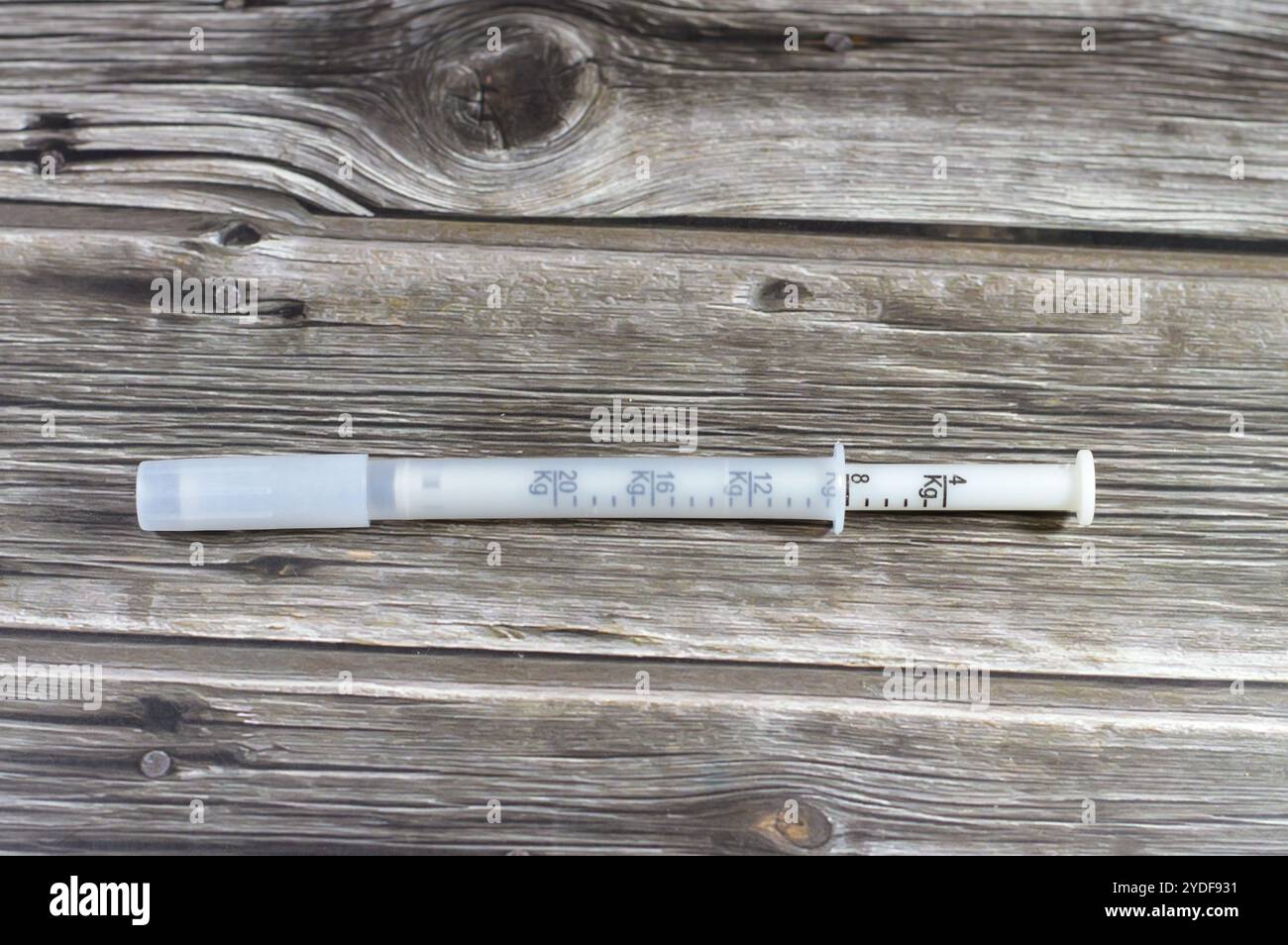 Graduated syringe in Kilograms KG for infants and children to calculate ...