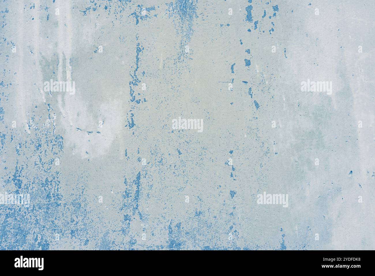 Textured plaster wall surface with peeling paint in various shades of ...