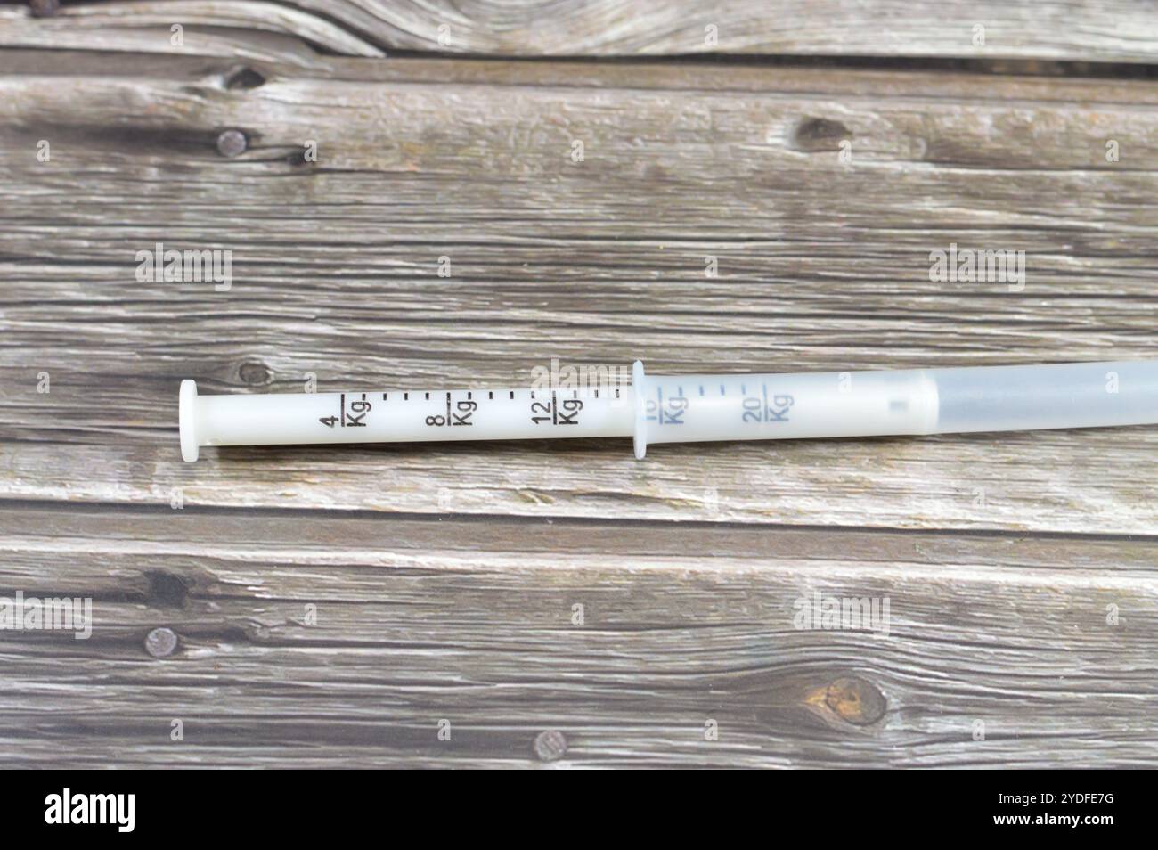 Graduated syringe in Kilograms KG for infants and children to calculate ...