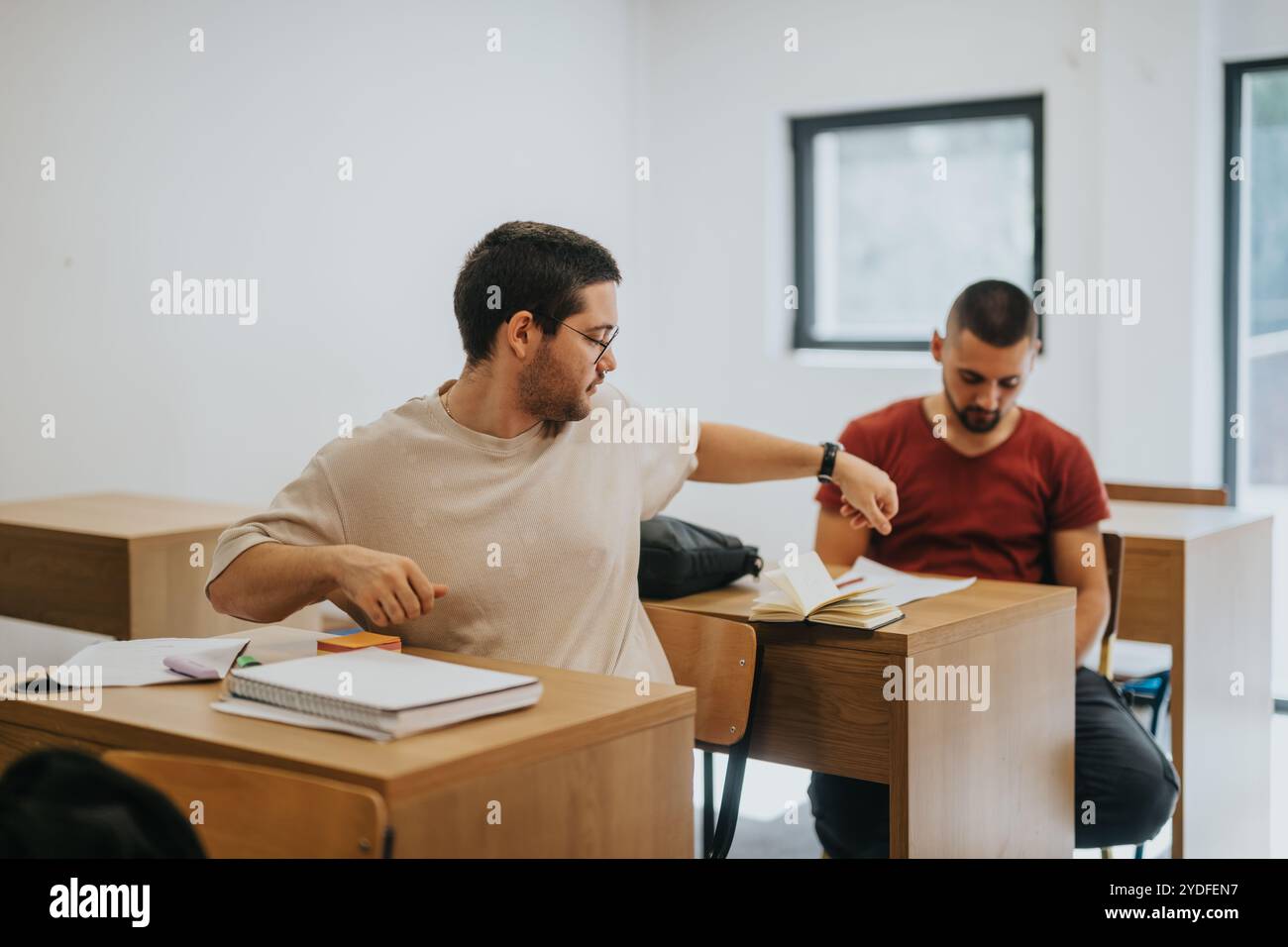 High school students studying together in classroom setting Stock Photo ...