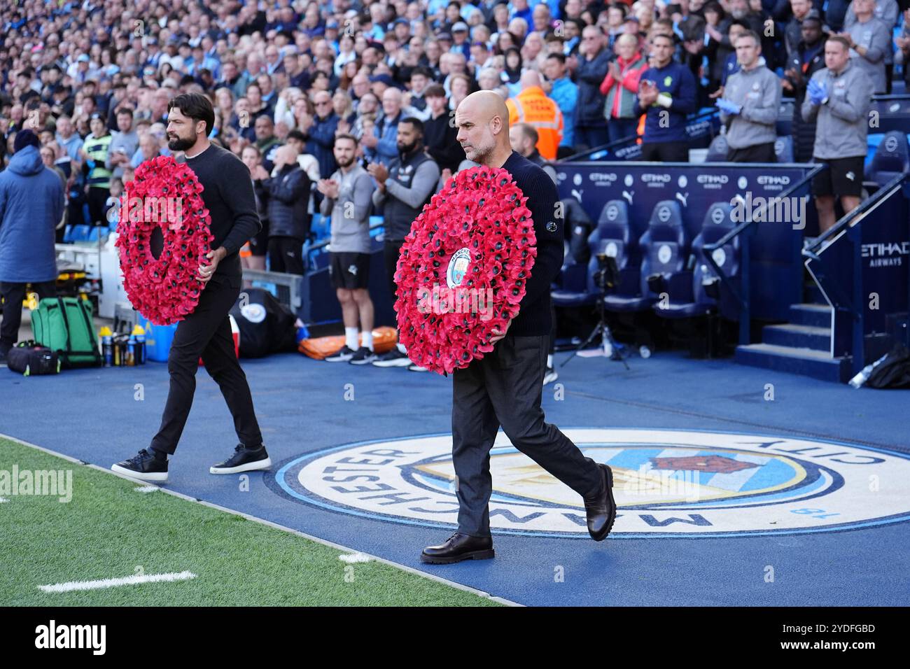 Manchester City manager Pep Guardiola (right) and Southampton manager ...