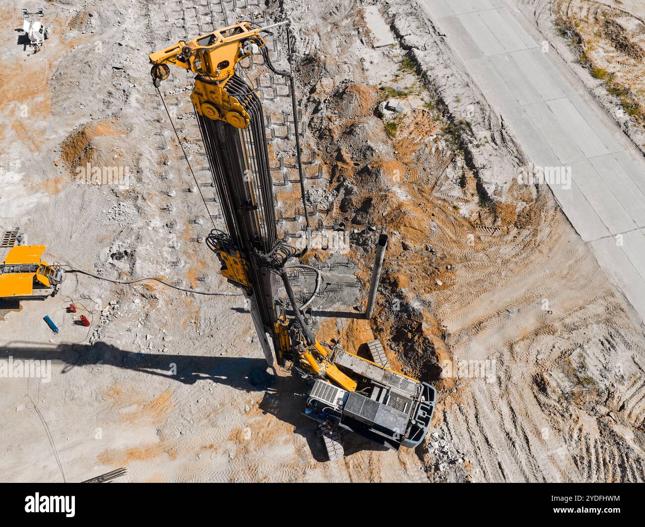 Drilling rig for constructing new mine on pile field Stock Photo - Alamy