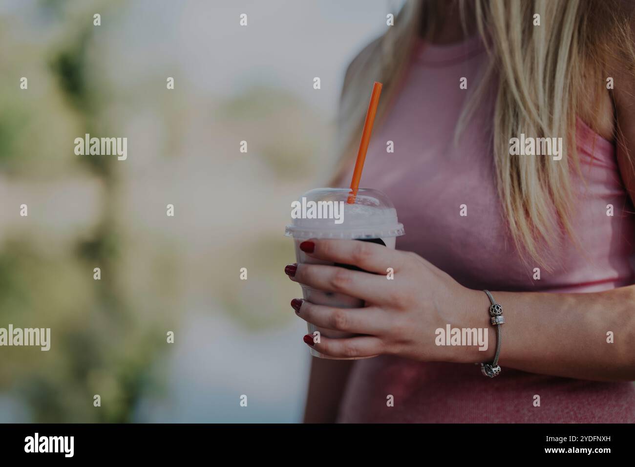 Woman enjoying iced drink outdoor hi-res stock photography and images ...